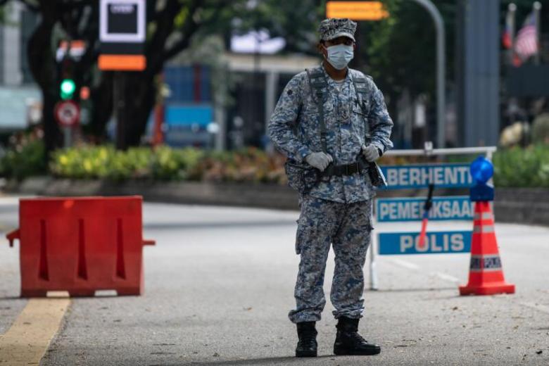 Malaysian police to put up more roadblocks to prevent sneak runs to ...
