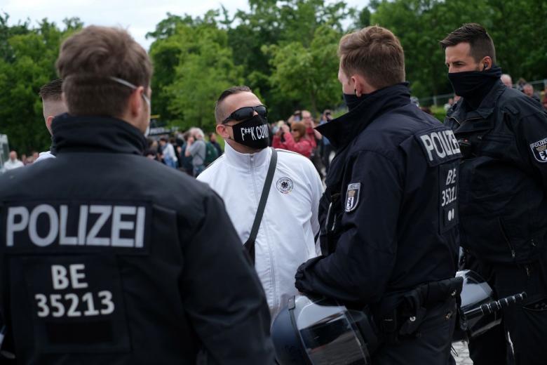 Police arrest 60 at protests against coronavirus lockdown in Berlin ...