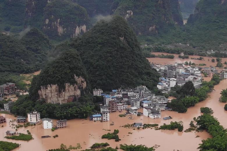 China vows to protect coronavirus-hit Hubei as dozens killed by floods ...