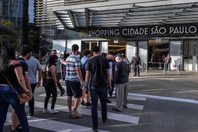 Crowds of shoppers head to Brazil malls reopening in big cities at ...