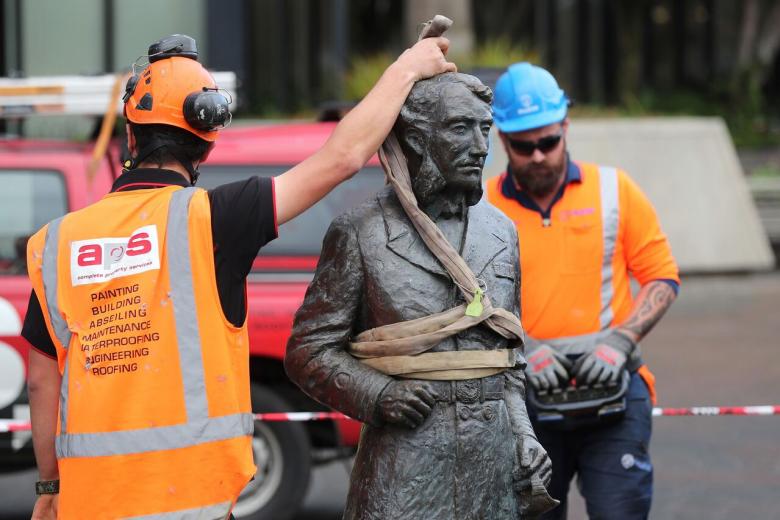 In Pictures: Controversial statues in various countries defaced, others ...