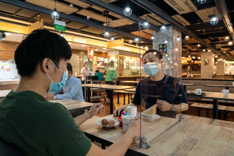 Transparent table-top separators to be installed in selected food ...