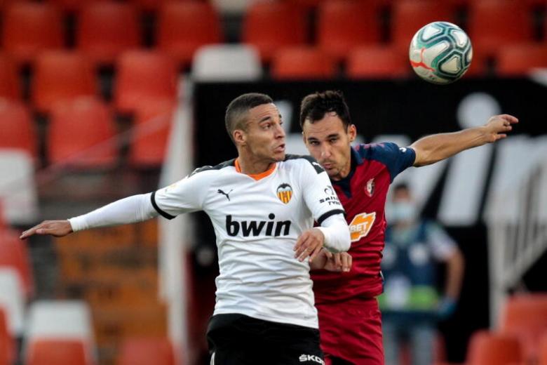 Football: Valencia earn first win since return | The Straits Times