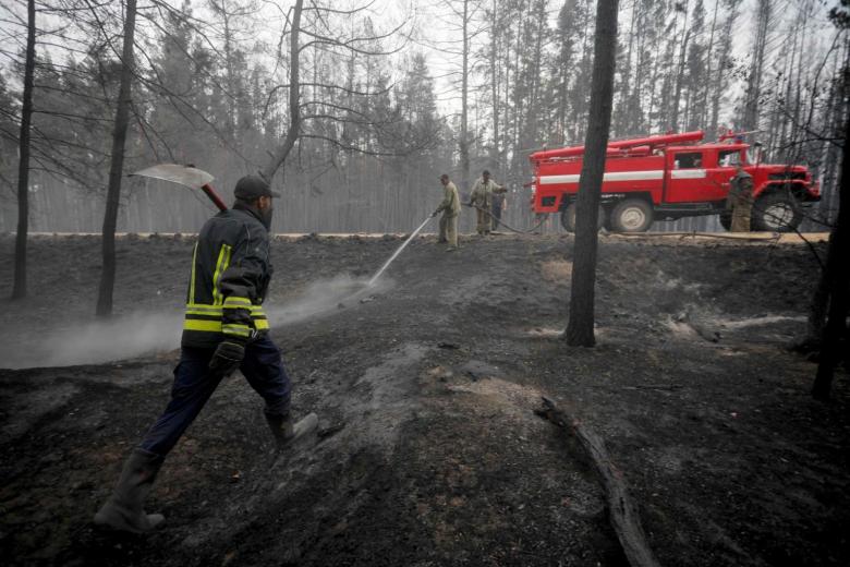 Ukraine firefighters beat back fatal forest blazes | The Straits Times