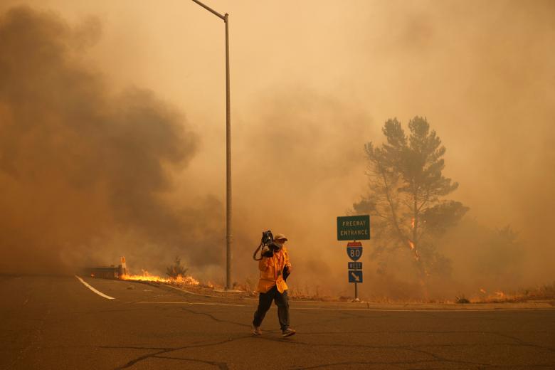 Two die fighting California lightning fires, tens of thousands flee ...