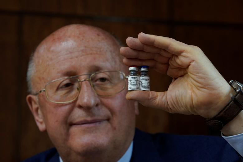Russian scientist behind Covid-19 vaccine defends 'wartime' roll-out ...