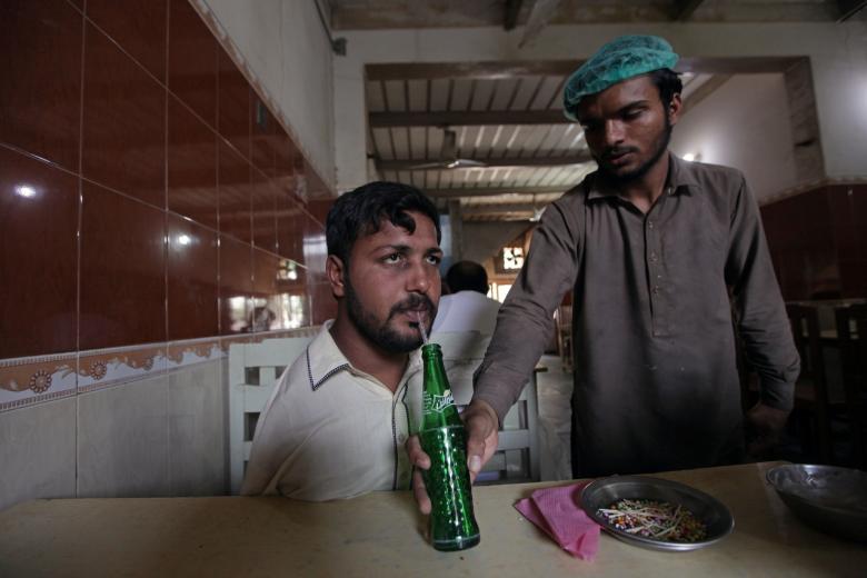 In Pictures: Man born without arms masters snooker | The Straits Times