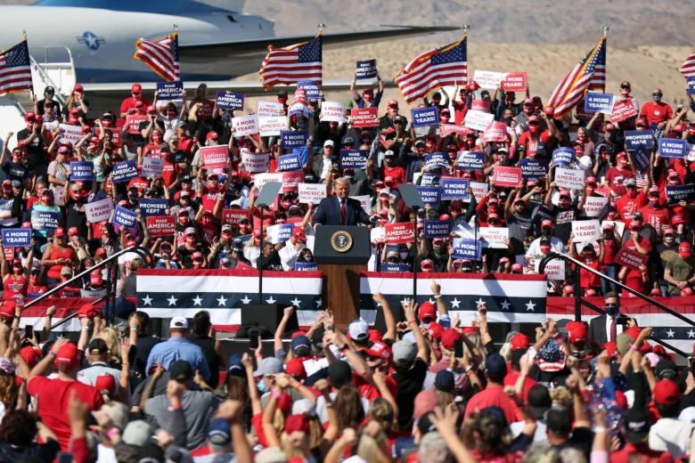 As Covid-19 roars back in US, Trump holds rally in battleground Arizona ...