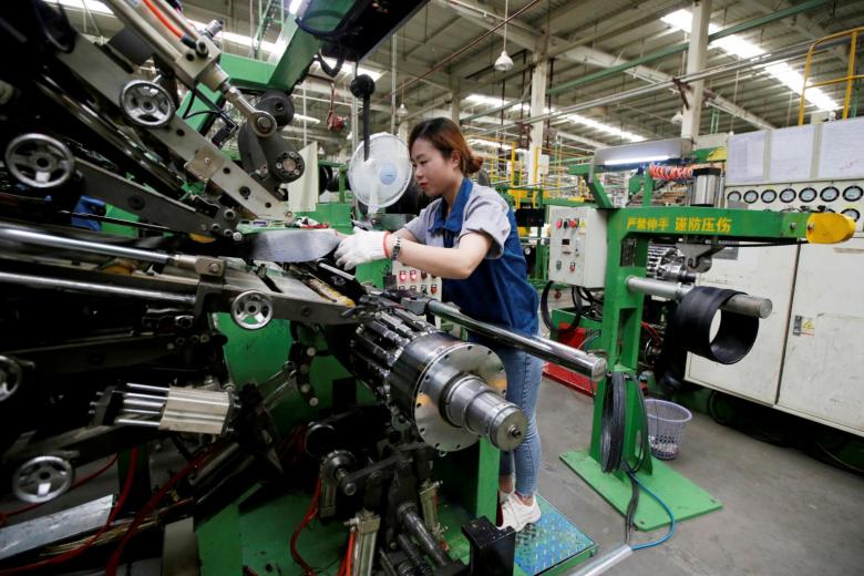 China's factory activity rises to near-decade high in October | The ...