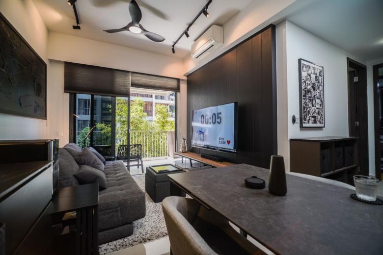 Maximising space in a tight, black-on-black apartment with clever ...