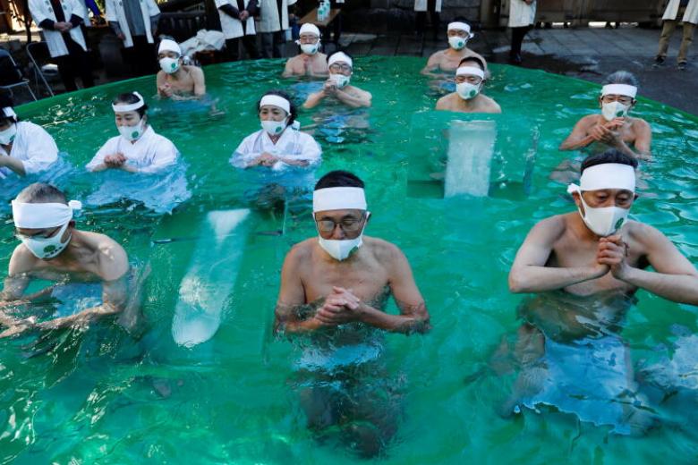 Japanese pray for end to coronavirus pandemic in annual ice bath ritual ...