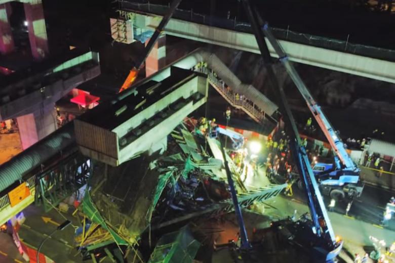 Two women killed as part of bridge under construction in KL collapses ...