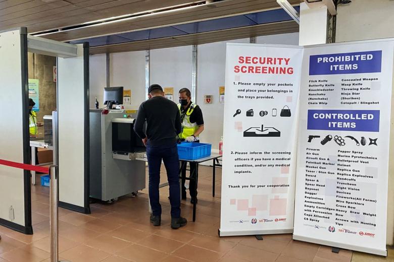 Tightened security checks kick off at selected MRT stations | The ...