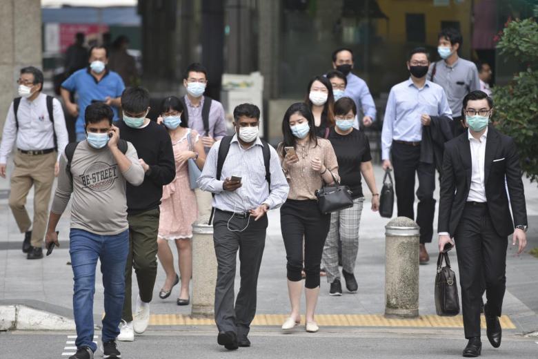 Staggered work hours already the norm at some companies in Singapore ...