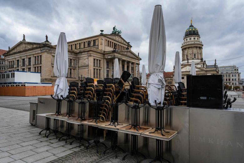 German Chancellor Angela Merkel's govt agrees law on curfews, tougher ...