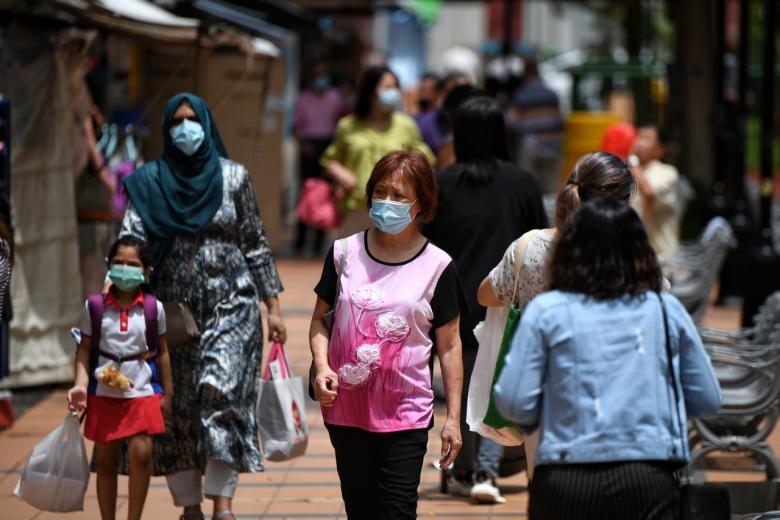 Why S'pore is back to phase 2: Hospital capacity, community exposure to ...