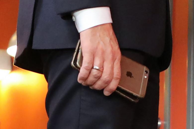 France's Macron changes phone in light of Pegasus case | The Straits Times