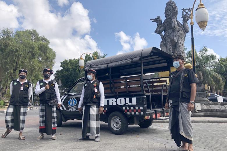 'Culture police' help in the battle to contain Covid-19 in Bali | The ...