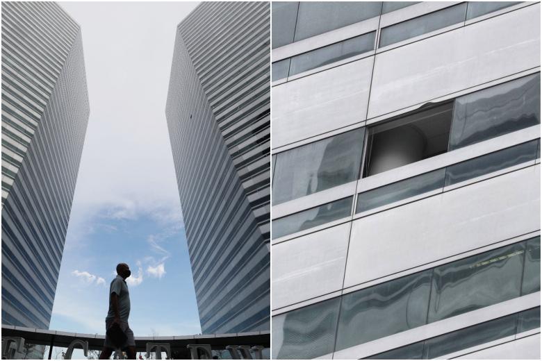 Fire extinguisher bursts, smashes through glass facade of skyscraper's ...