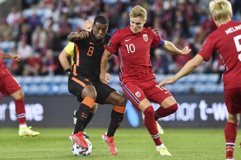 Football: Dutch draw with Norway in meek World Cup qualifier start ...