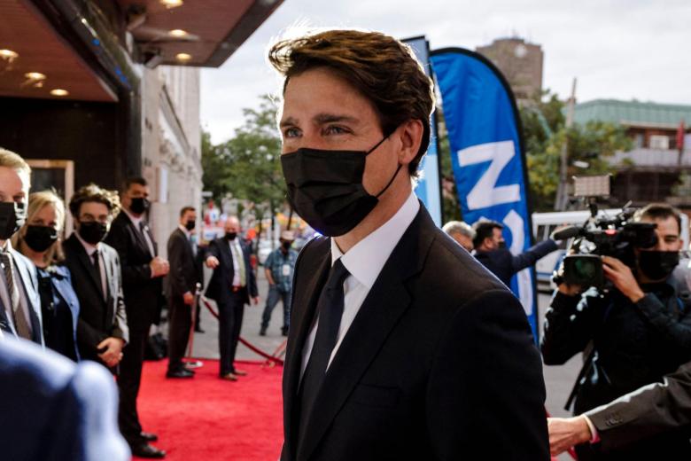 Canada's Trudeau, struggling in campaign, on defensive over election ...