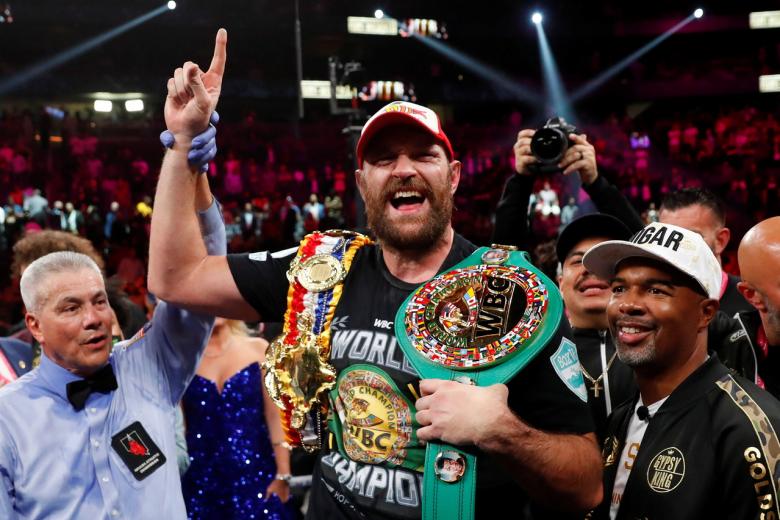 Boxing: Fury defeats Wilder with 11th round knockout to retain WBC ...