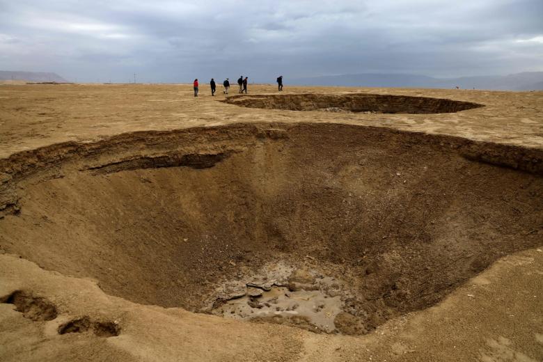 Sinkholes on receding Dead Sea shore mark 'nature's revenge' | The ...