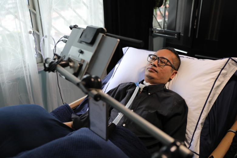 Eye-gaze device a bridge between him and the world | The Straits Times