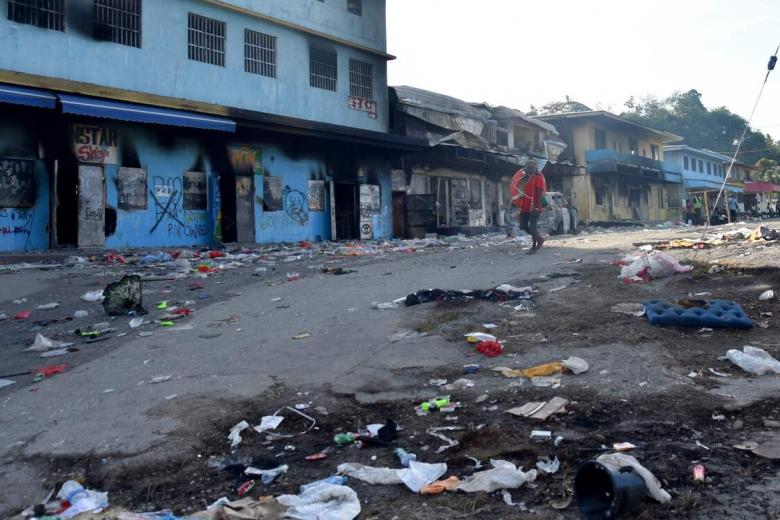 Nervous residents clean streets in riot-hit Solomon Islands capital ...
