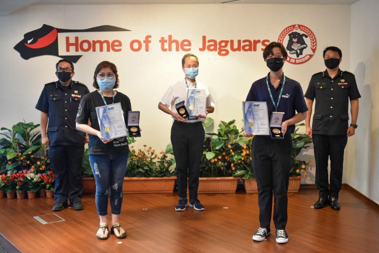 Six receive SCDF award for saving a man's life, fighting fire | The ...