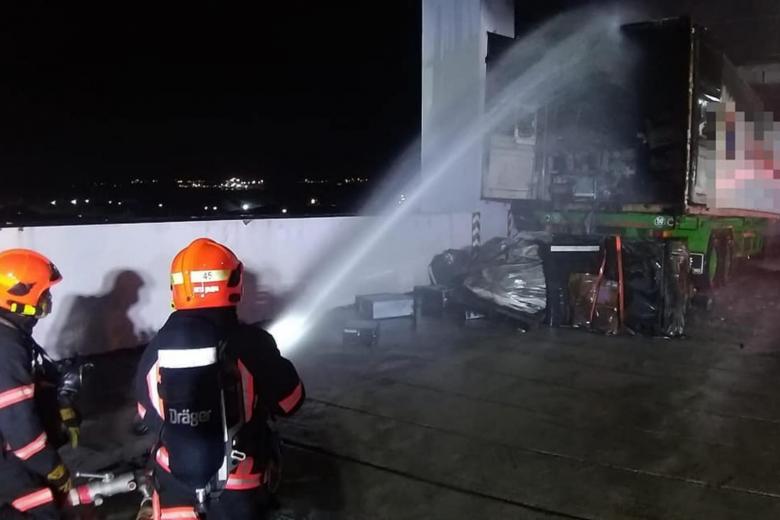 White smoke seen coming out of parked container truck which caught fire ...