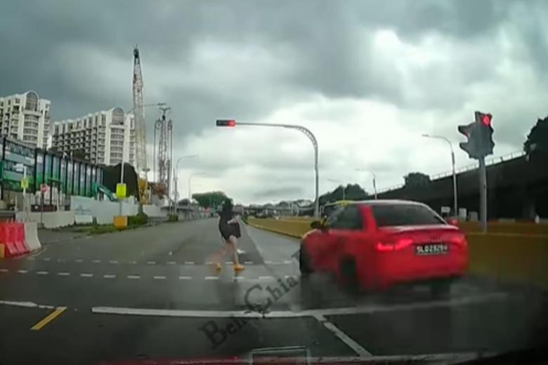 Driver arrested after running red light in Lentor, narrowly missing ...