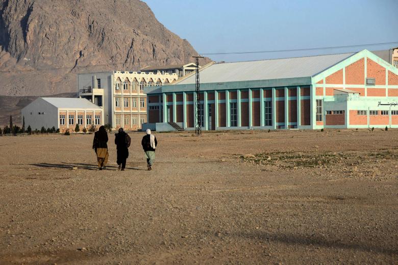 Female students join male peers as Afghan universities reopen | The ...