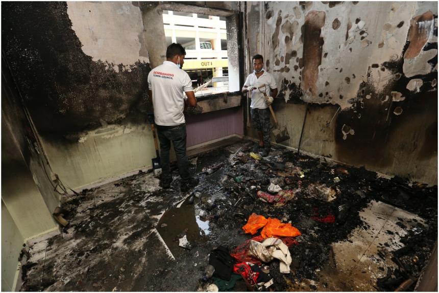 Woodlands flat catches fire; 15 people evacuated, 2 taken to hospital ...