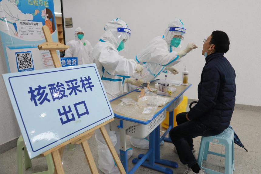China's Hangzhou starts mass Covid-19 testing, Shanghai cases drop ...