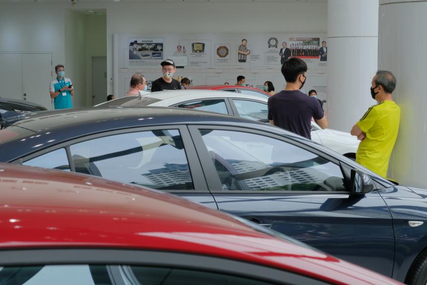 Car makers adopting direct sales model in S'pore: Can lower prices be ...