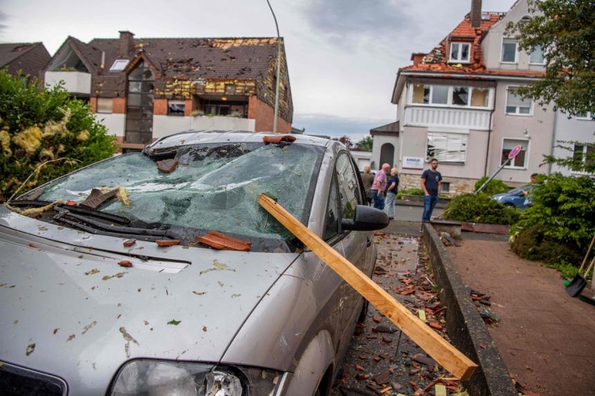 One killed, 40 injured, as suspected tornado hits Germany | The Straits ...