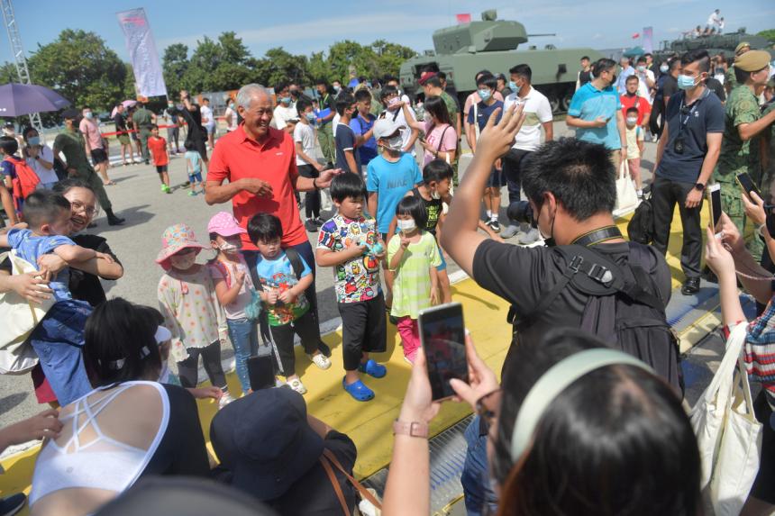 Crowds throng F1 Pit Building on opening day of Army Open House | The ...