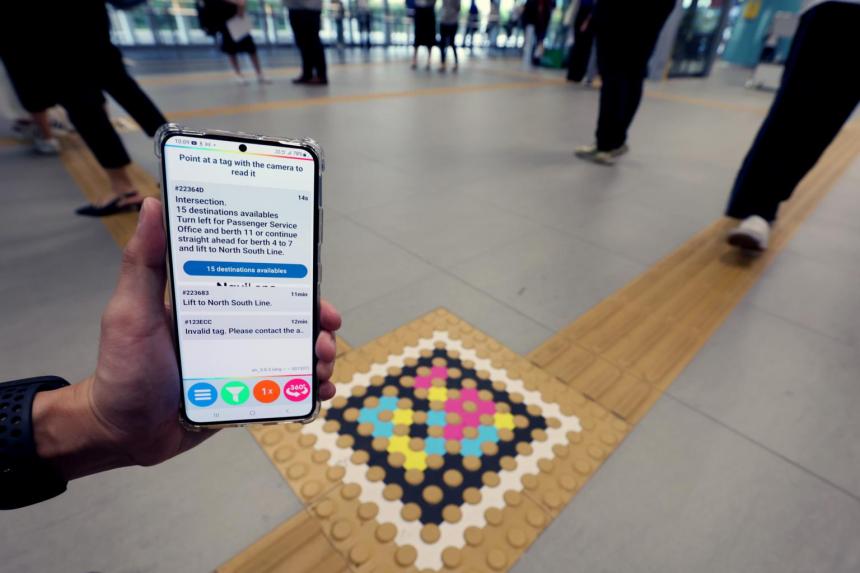 SMRT rolls out app to help visually impaired commuters at Woodlands ...
