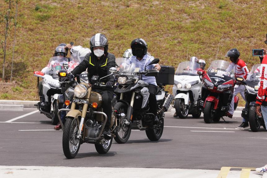 DPM Lawrence Wong rides with motorcycle convoy to raise funds for ...
