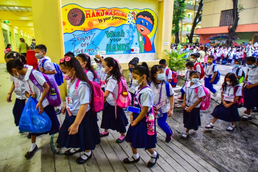 In Pictures: Philippines reopens schools after more than two years ...
