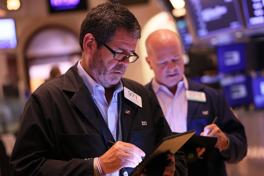 US stocks end mostly lower as markets await Fed outlook | The Straits Times