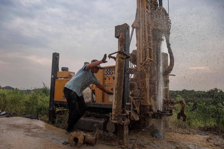 Chinese drillers work 15-hour days building wells in drought-hit ...