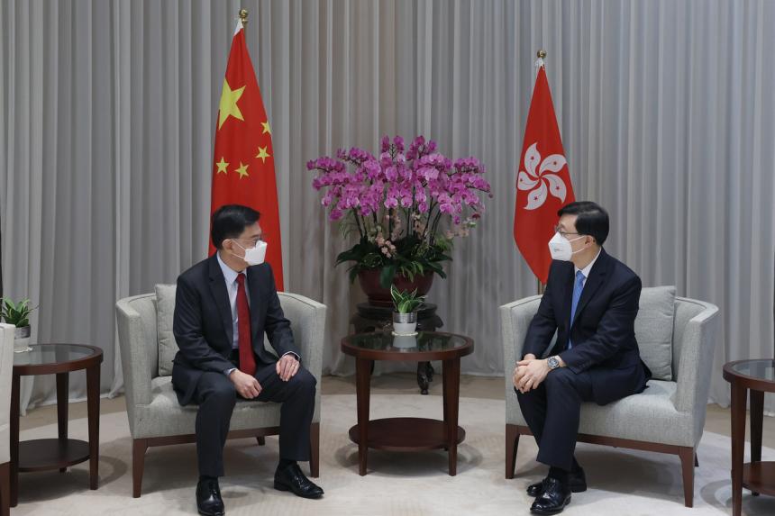 DPM Heng meets Hong Kong's Chief Executive John Lee as part of working ...