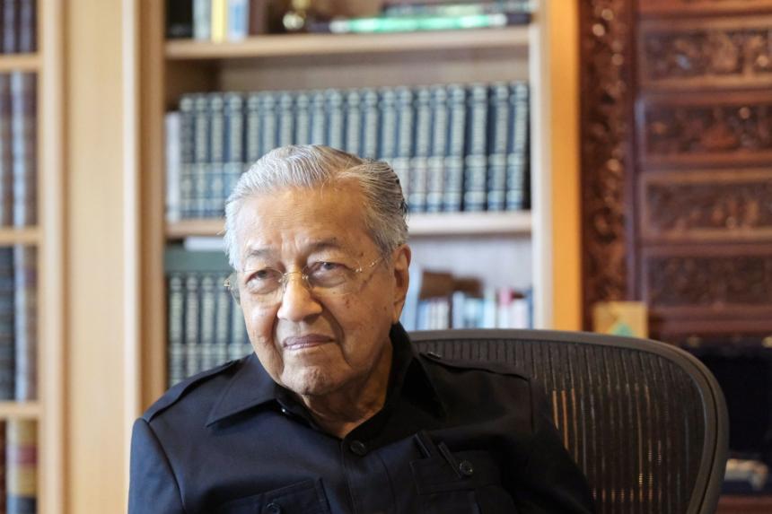 Malaysia's ex-PM Mahathir, 97, discharged from hospital after Covid-19 ...