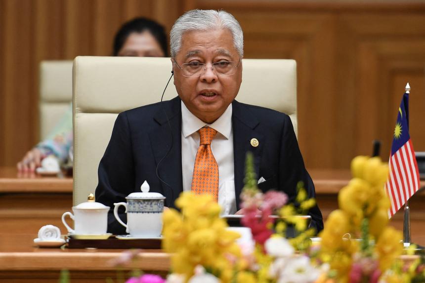 BN chief Zahid says Ismail remains coalition's candidate for Malaysia ...