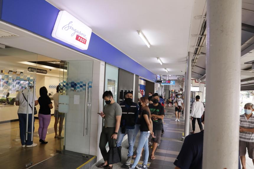 SingPost sinks into red with $9.9m first-half loss despite record ...