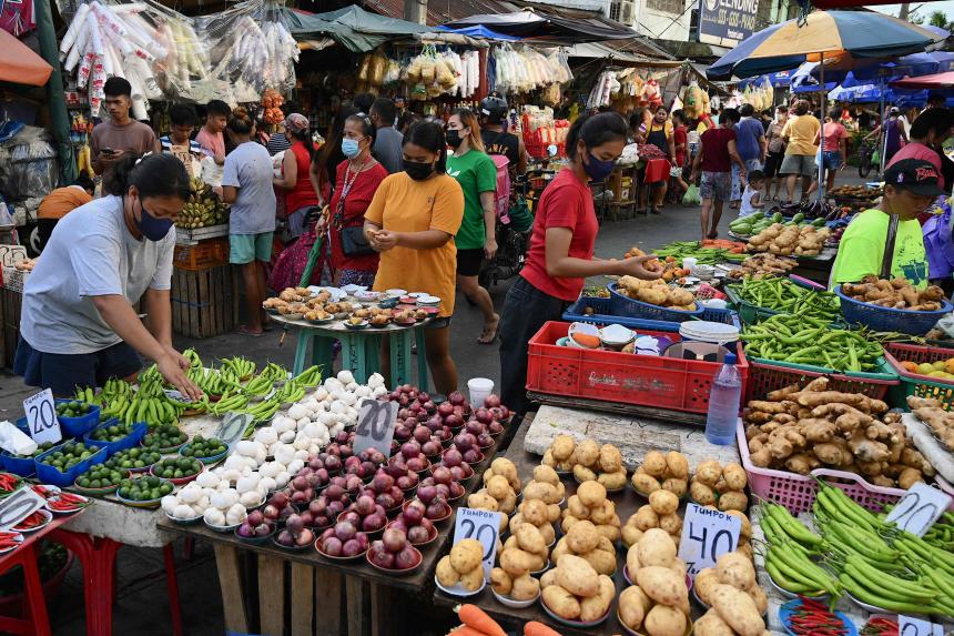 Filipinos tighten belts as inflation soars to 14-year high | The ...
