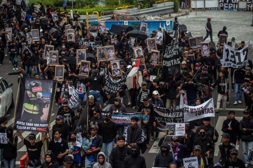 Indonesians march for justice after deadly soccer stampede | The ...