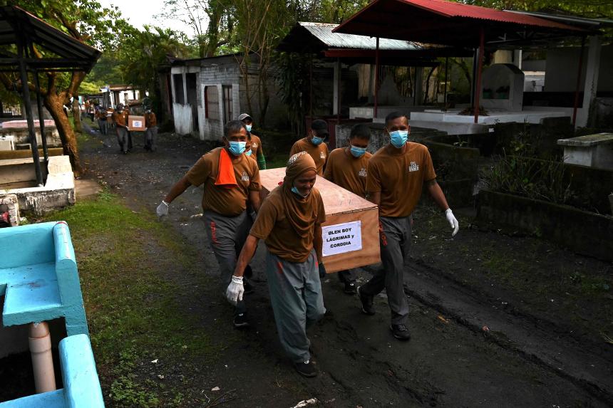 Philippines' largest prison holds mass burial for 70 inmates | The ...